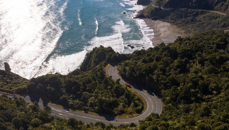 Great Coast rd Greymouth to Westport Bare Kiwi - RentAClassic Car Hire